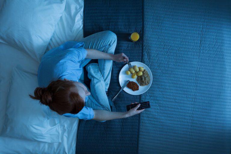 Why Eating In Bed Is Bad For You